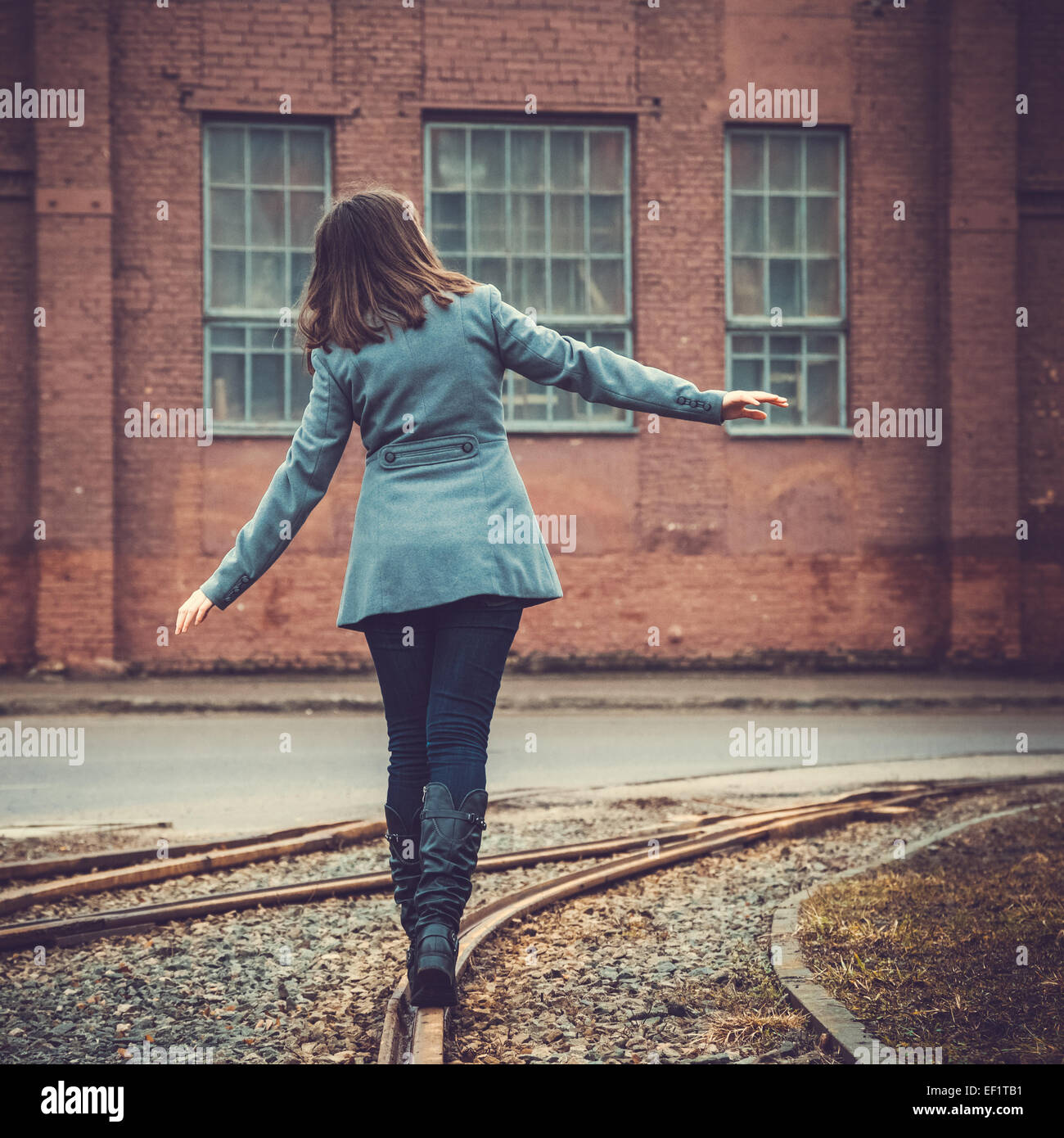 Beautiful girl on train tracks hi-res stock photography and images - Alamy