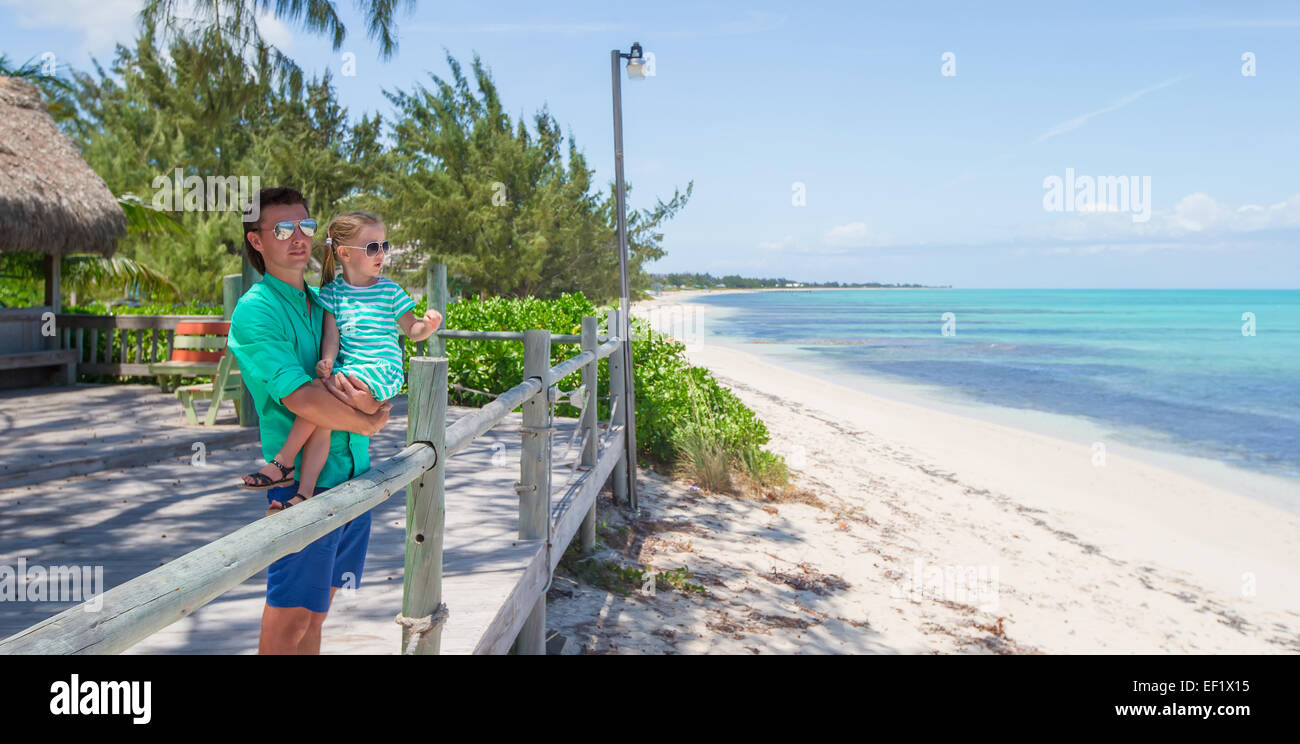 Young dad and his daughter walking on tropical island Stock Photo - Alamy