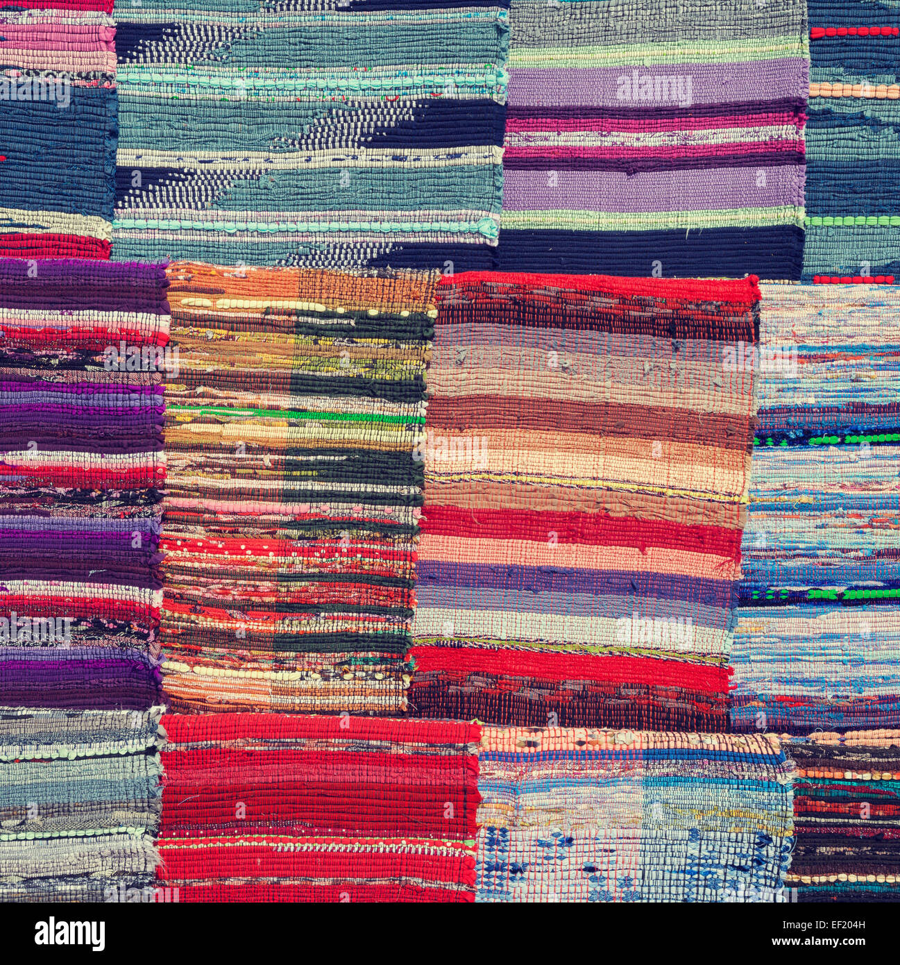 Traditional colorful rug textile. Ethnic design Stock Photo - Alamy