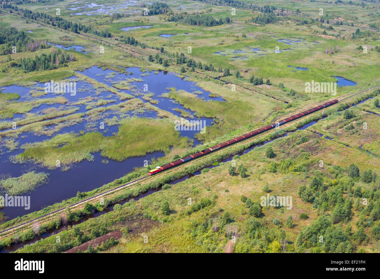 Aerial view of bog landscape and train with turf Stock Photo - Alamy