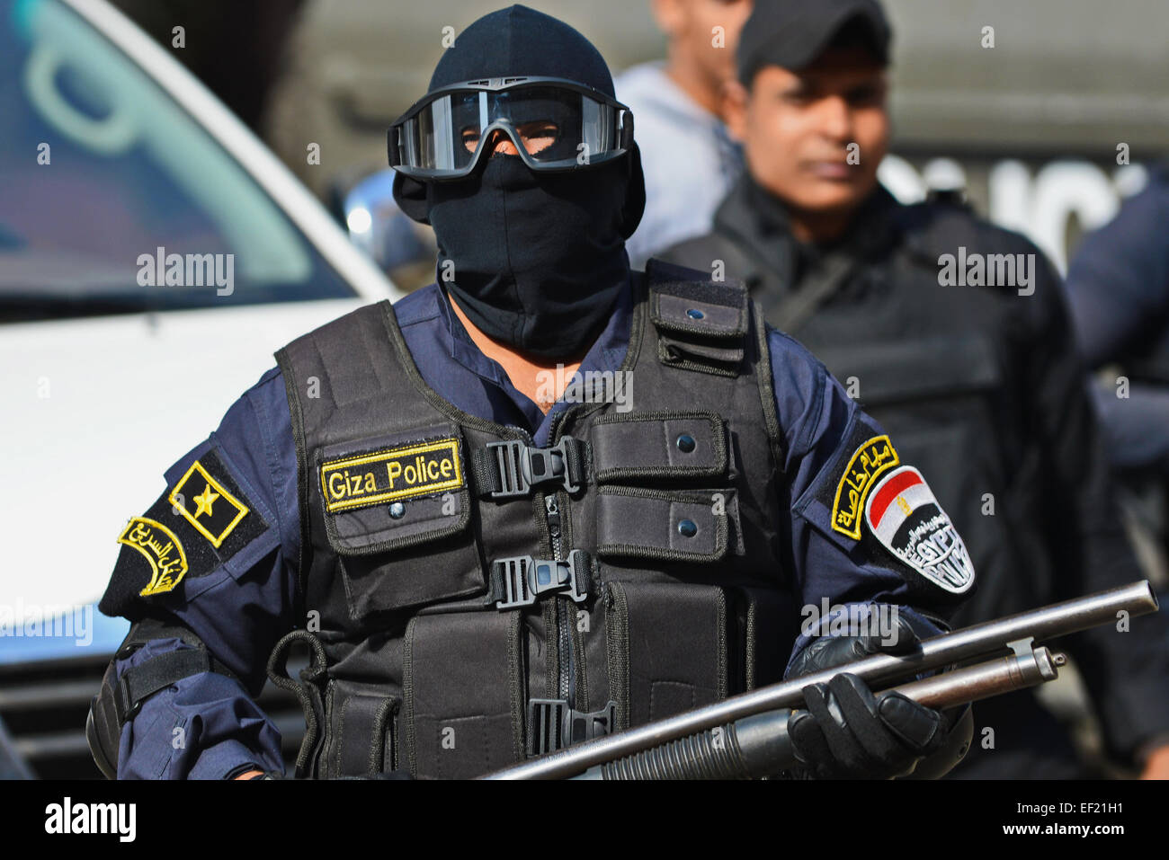 Cairo, Egypt. 25th Jan, 2015. Egyptian security forces stand guard at ...