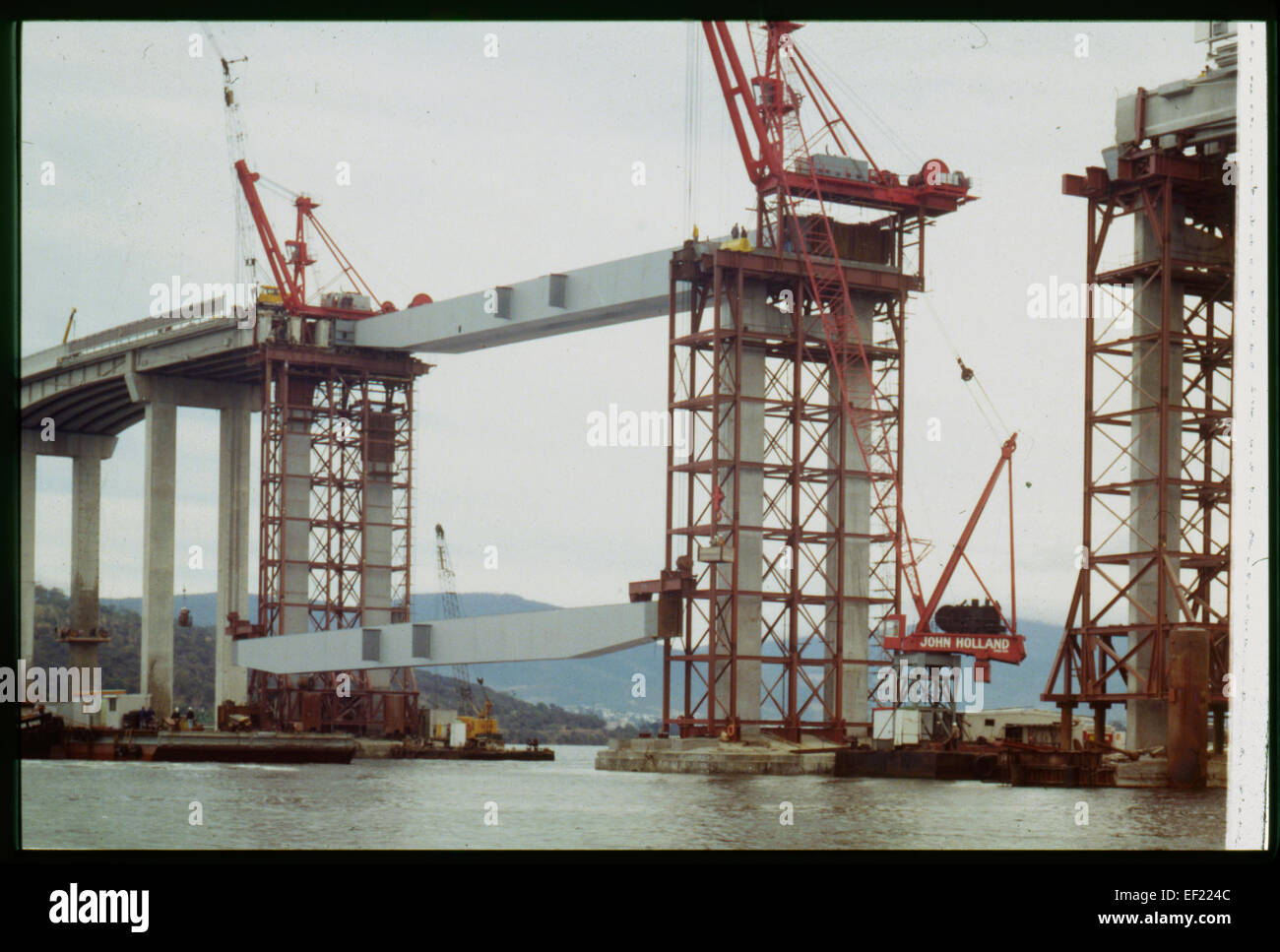 This image captures the repair efforts following the 1975 disaster at ...