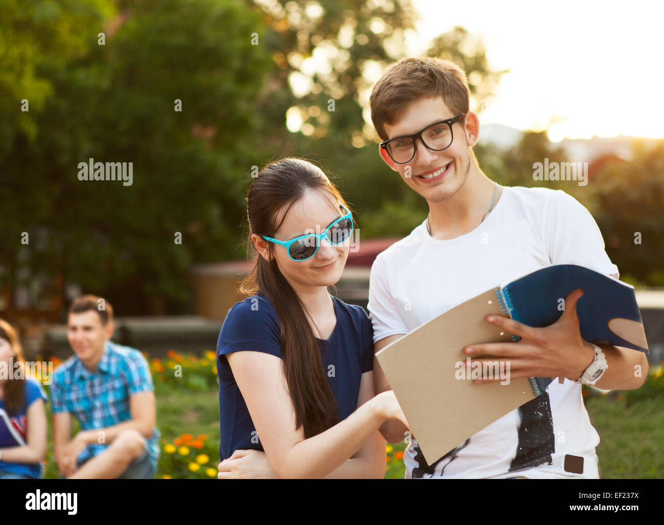 Couple of college students during a brake between classes - chatting ...
