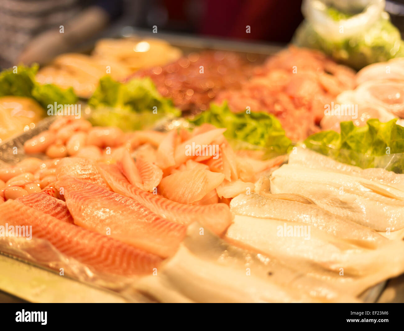 Raw fish at a night market in Taiwan Stock Photo - Alamy