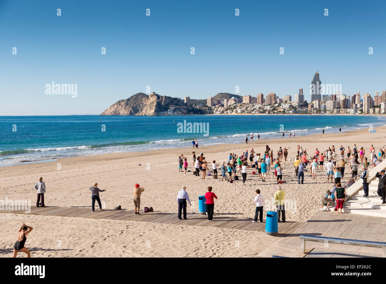 BENIDORM, SPAIN - JANUARY 17, 2015: People relaxing on the beach of ...