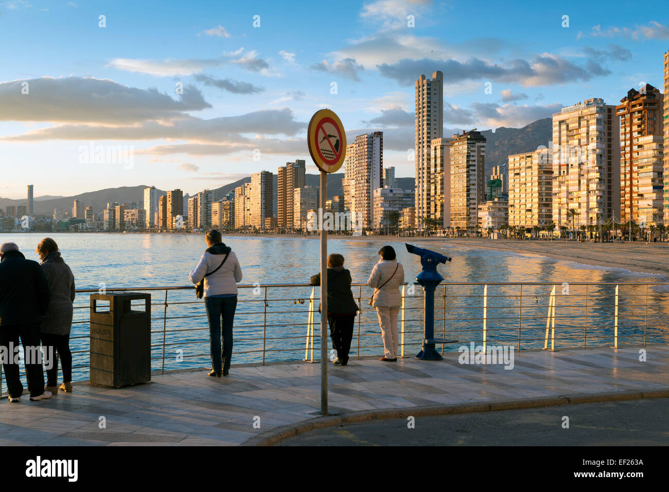 BENIDORM, SPAIN, JANUARY 20, 2015: tourists enjoy a warm winter day ...
