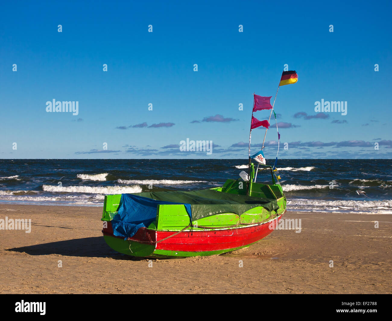 A fishing boat on shore of the Baltic Sea Stock Photo - Alamy