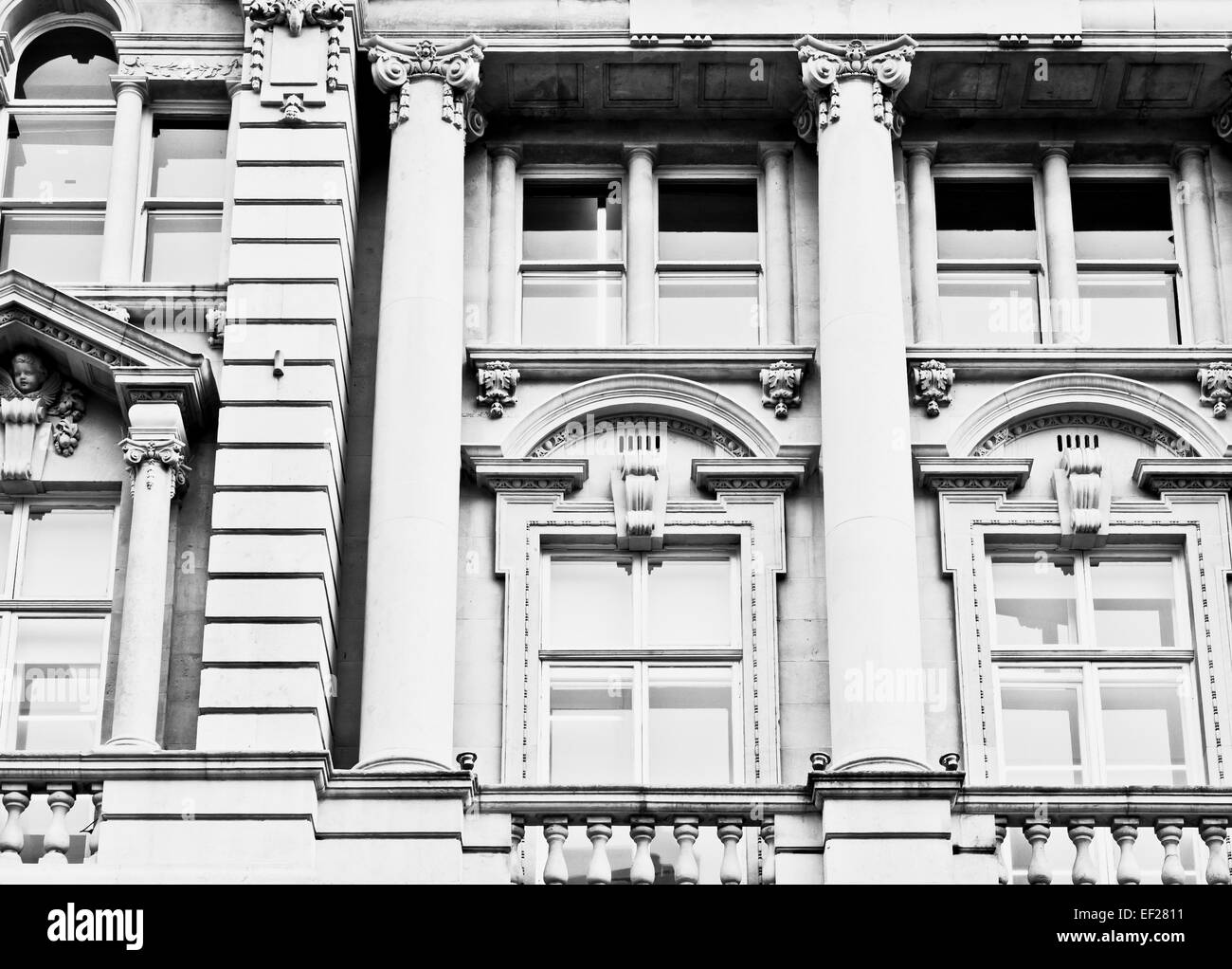 Details of pillars and windows in a well preserved building in the UK ...