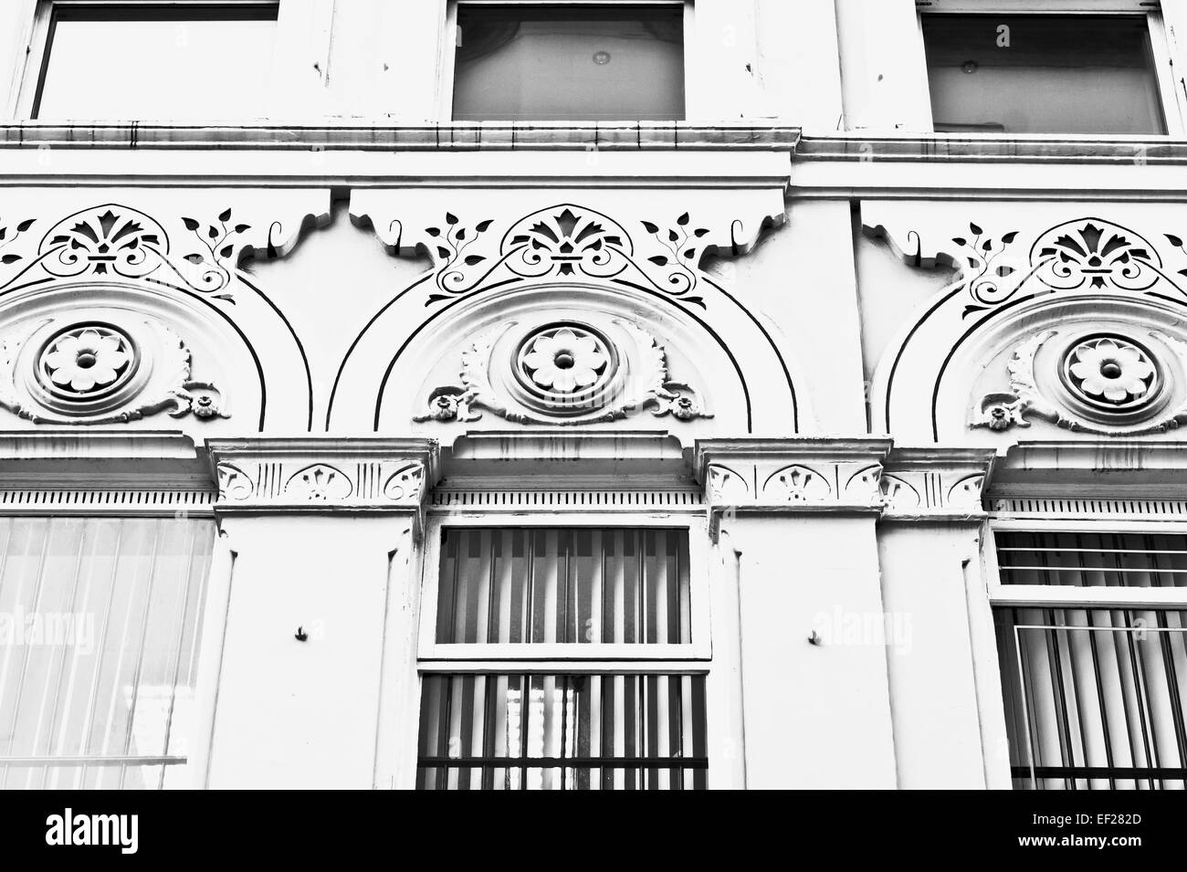 Arch windows in a building in the UK Stock Photo - Alamy