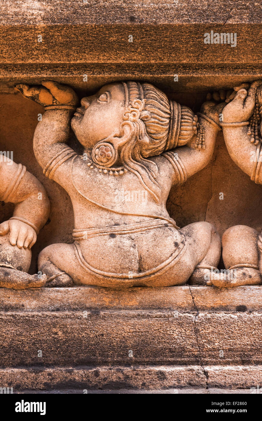 Carved stone dwarf on the New Temple House at the Buddhist Kelaniya ...