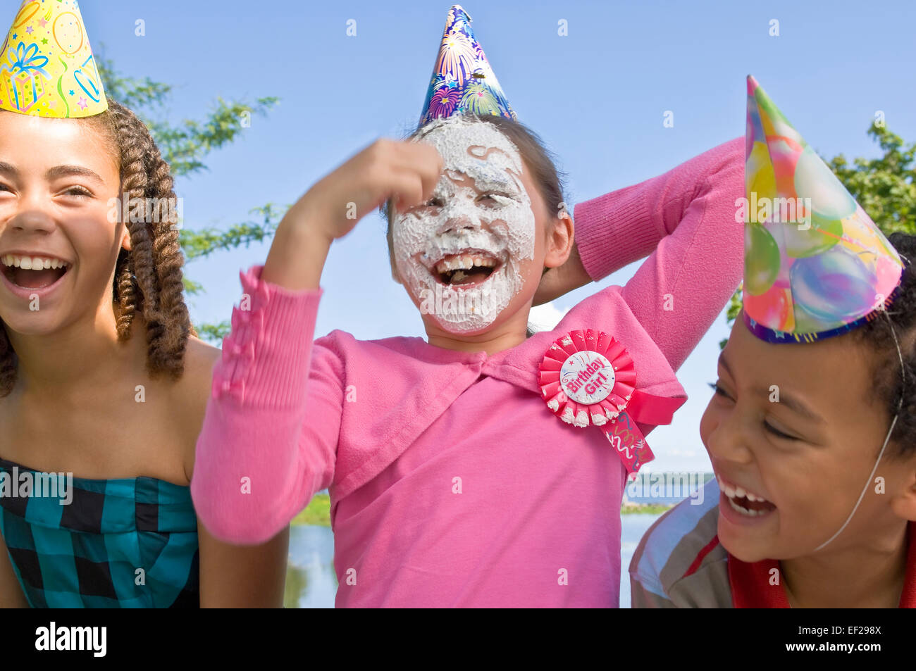 Child's face covered in icing Stock Photo - Alamy