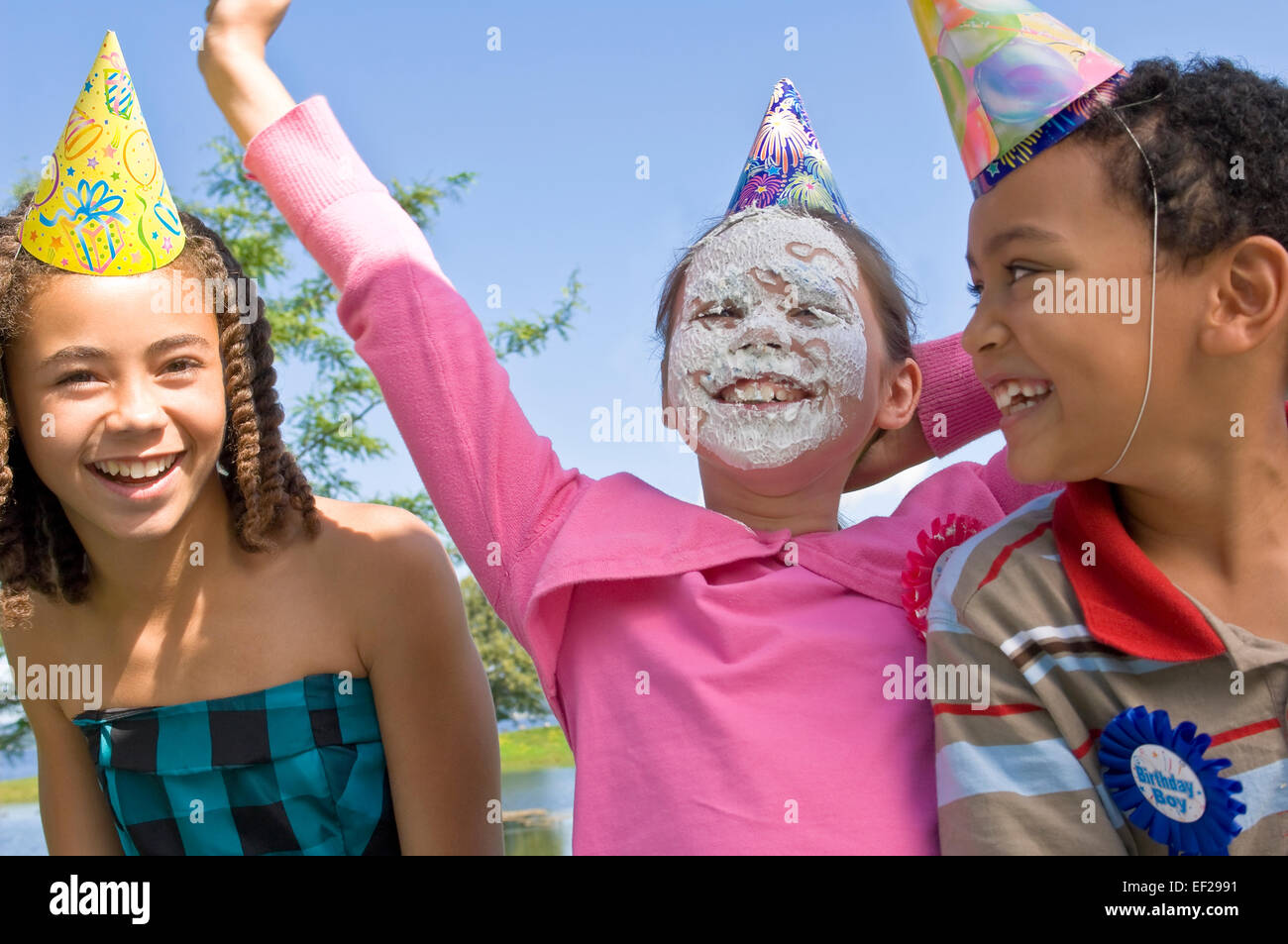 Child's face covered in icing Stock Photo - Alamy