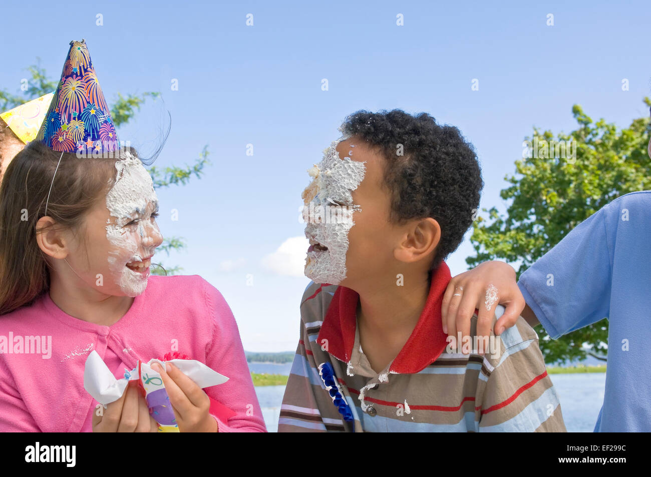 Children with icing on their faces Stock Photo - Alamy