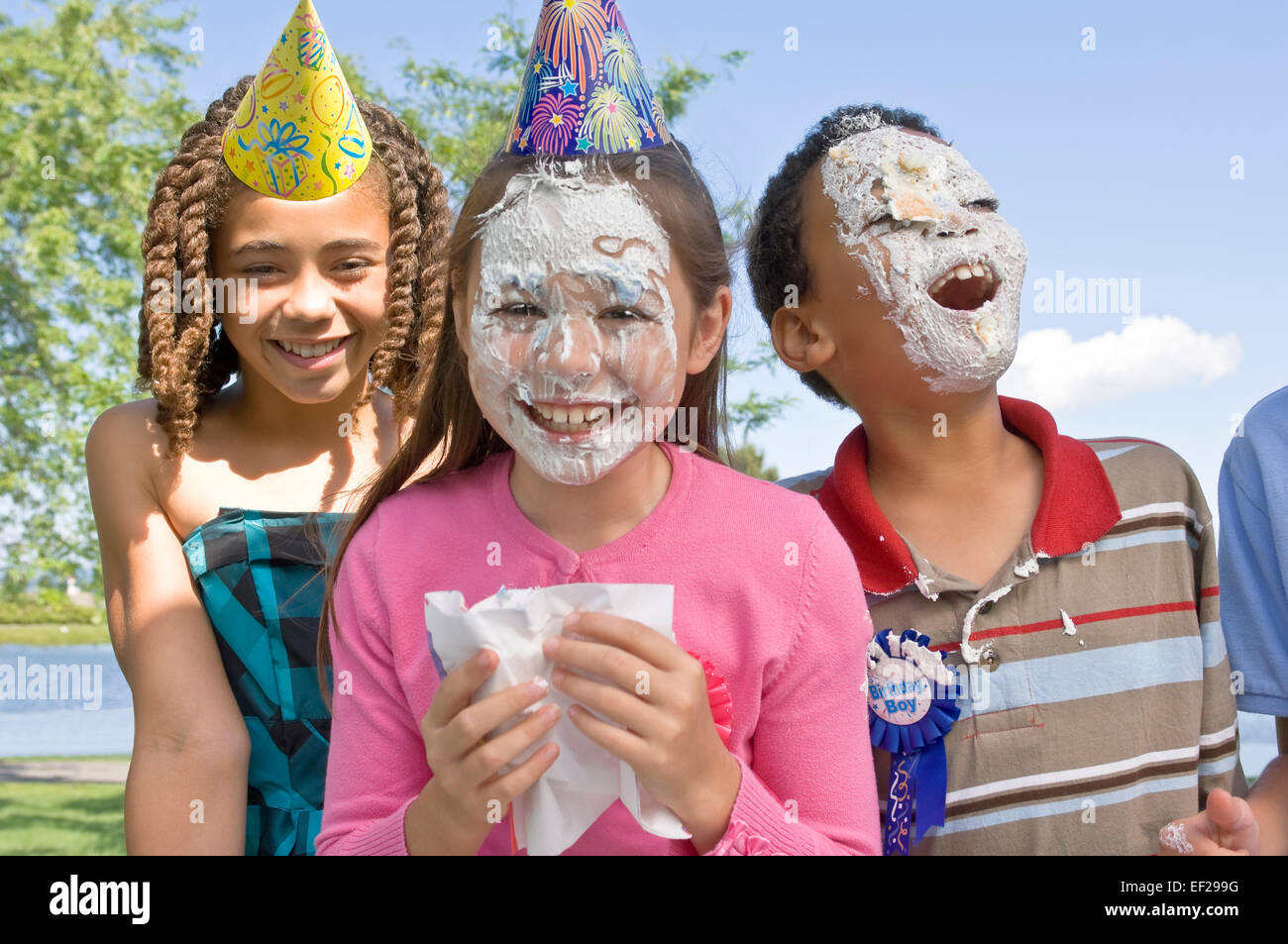 Children with icing on their faces Stock Photo - Alamy
