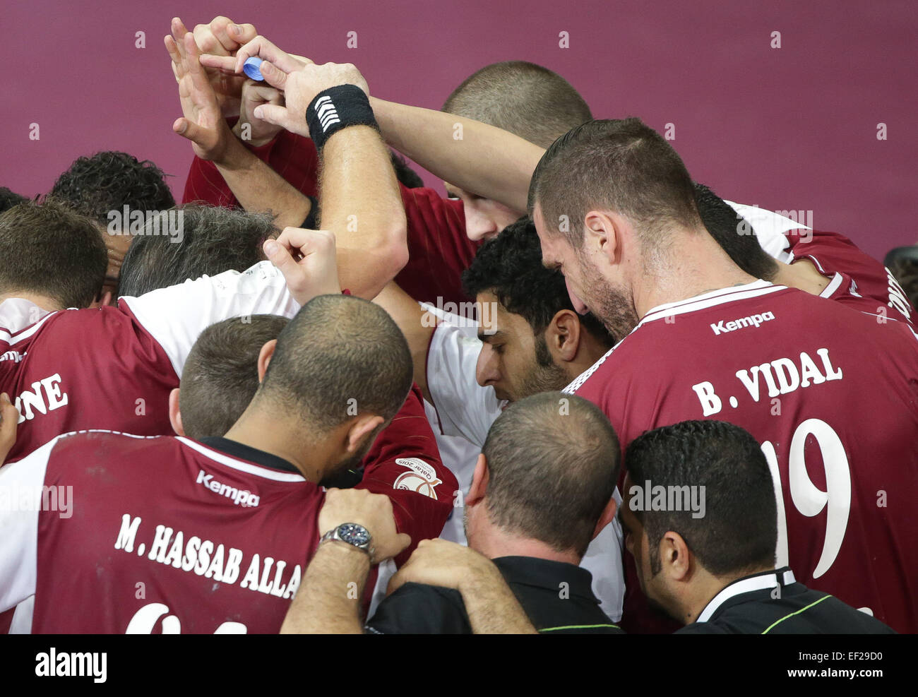 Team Qatar concentrates after a time-out during the men's Handball ...