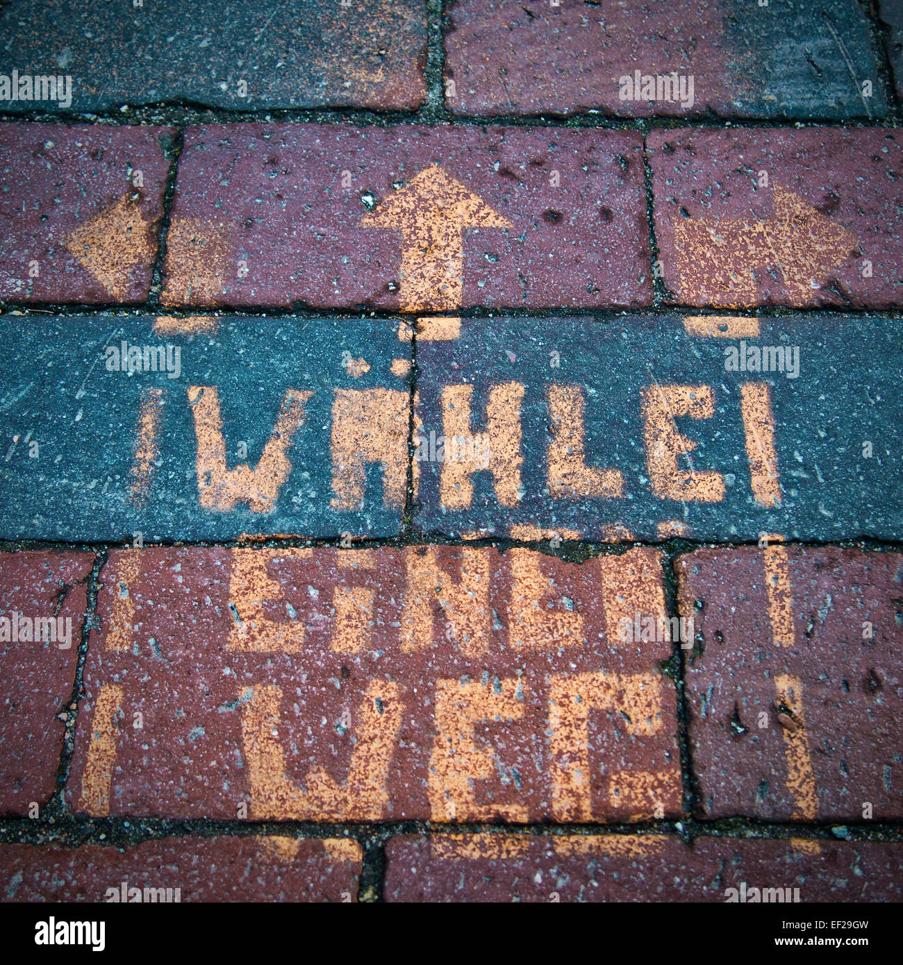 Writing on a road Stock Photo - Alamy