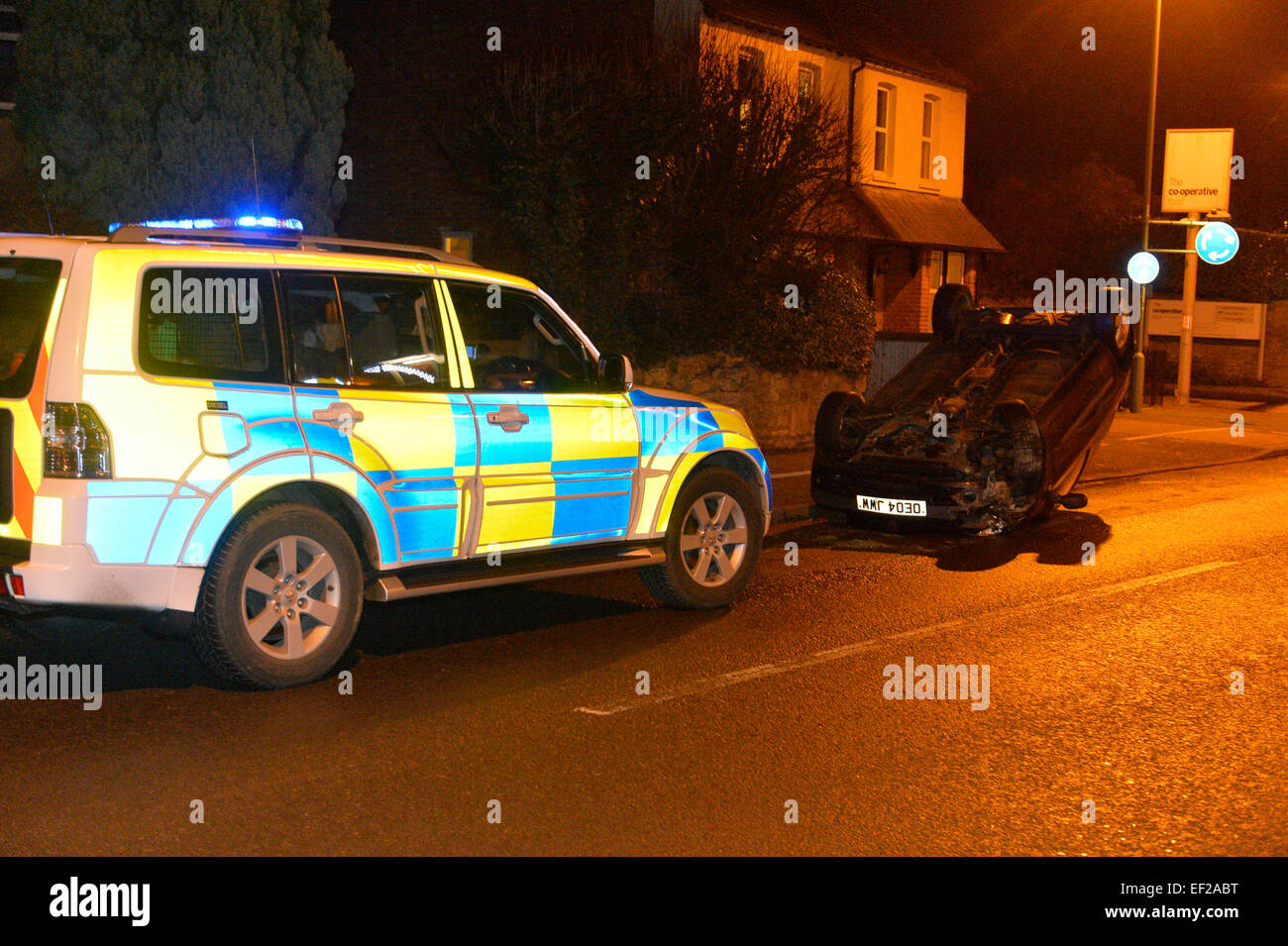 Overturned car after accident in Long Hanborough Stock Photo - Alamy