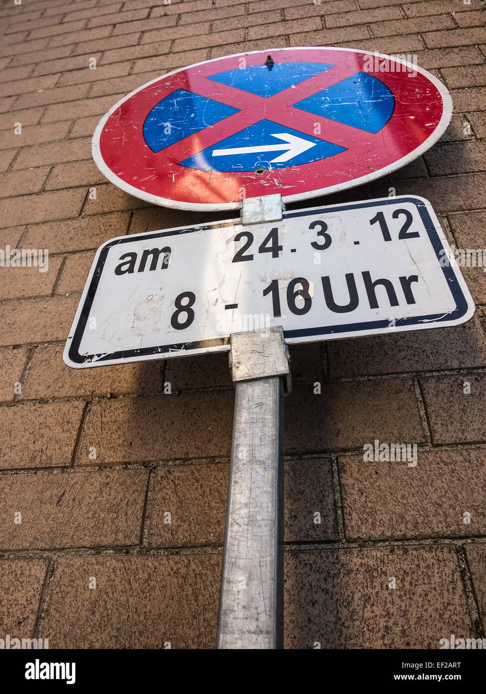 A parking sign on the ground Stock Photo - Alamy
