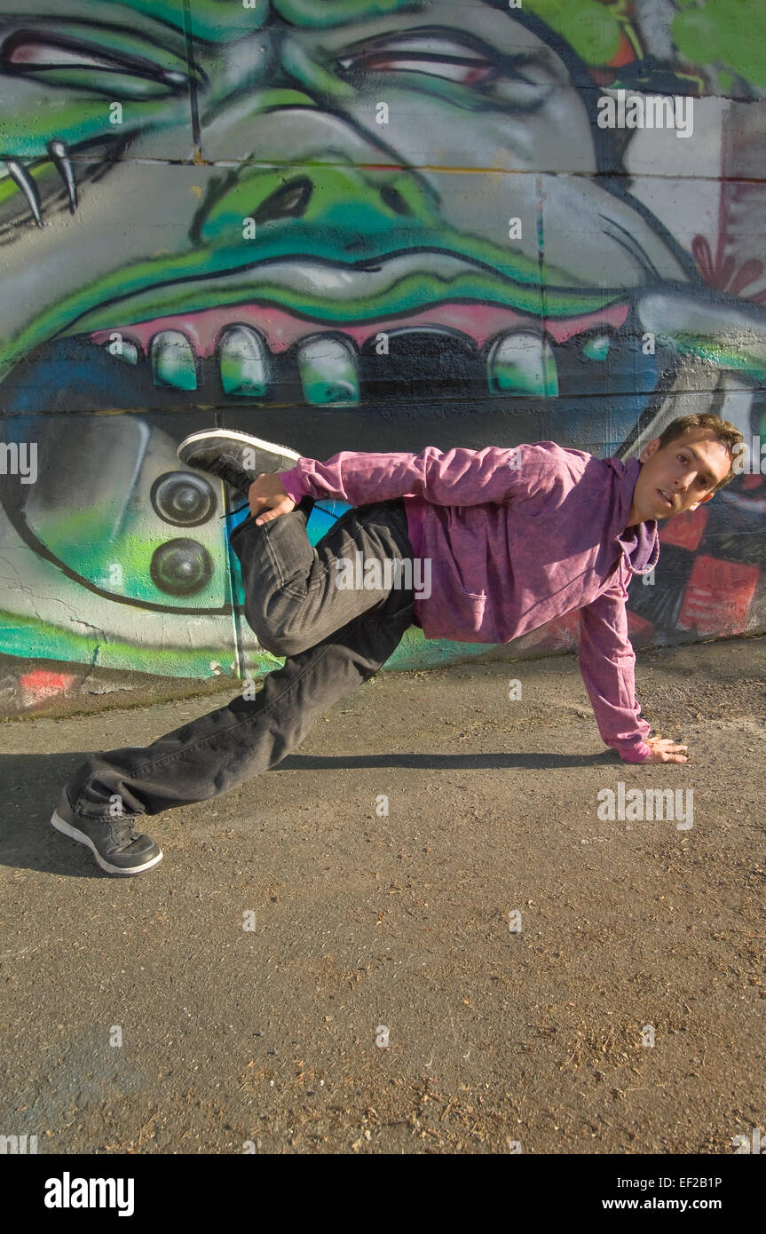 Teenage boy break dancing Stock Photo - Alamy