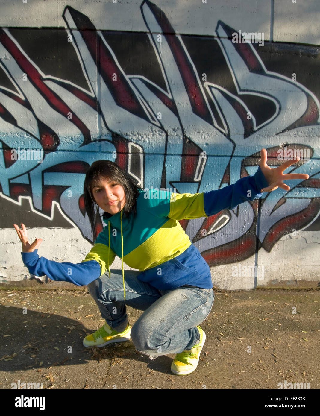 Teenage girl break dancing Stock Photo - Alamy