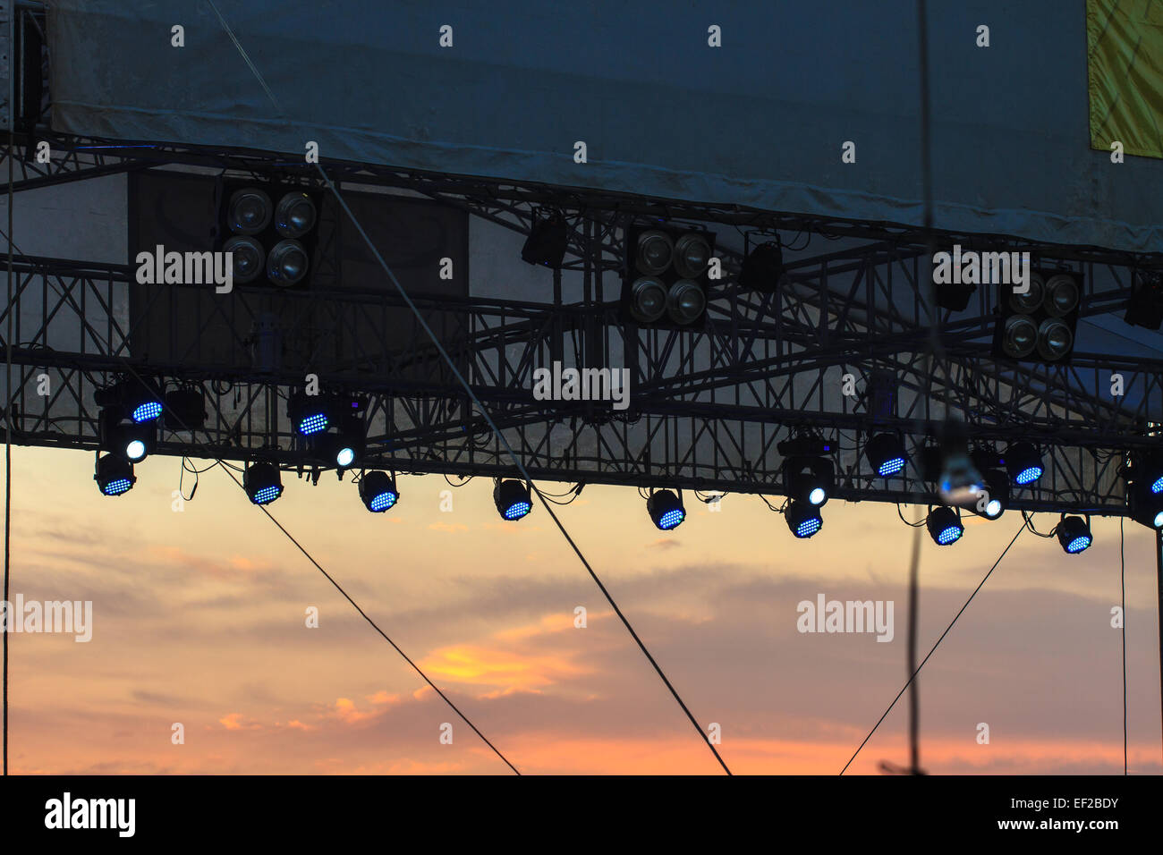 multiple spotlights on a theatre stage lighting rig for consert Stock ...