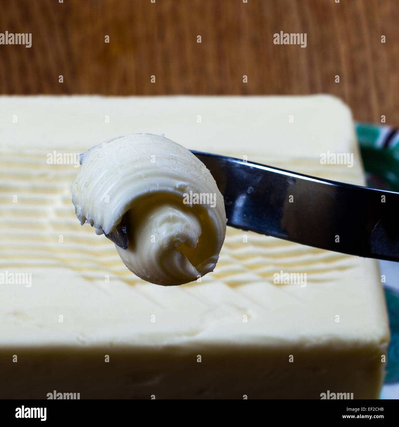 Roll of butter Stock Photo - Alamy