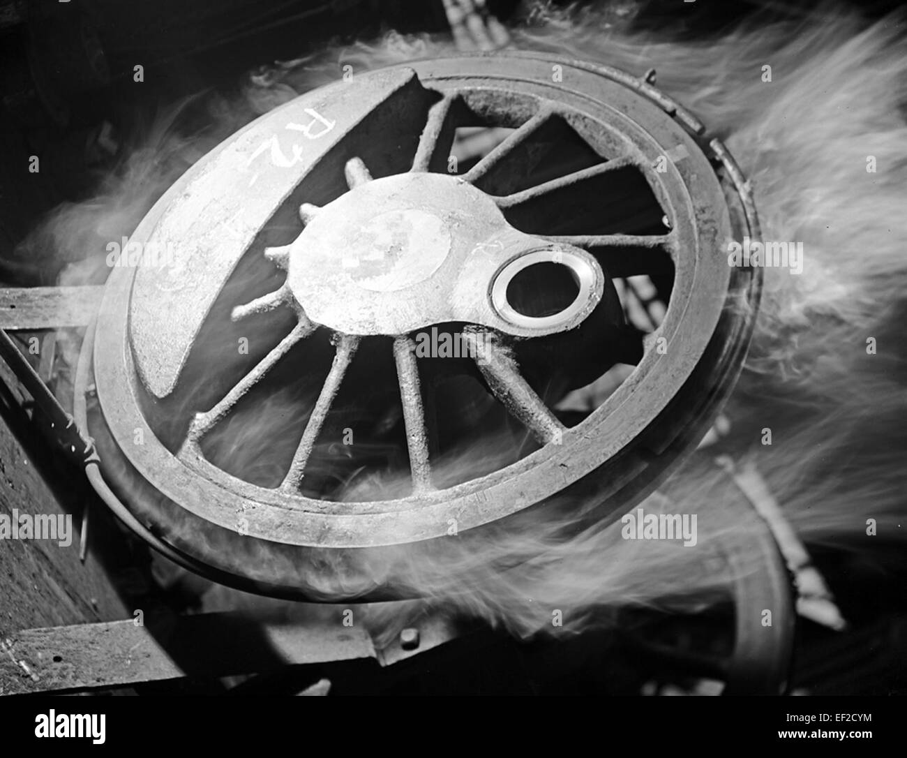 This image shows a marked locomotive wheel, labeled R2, used by the ...