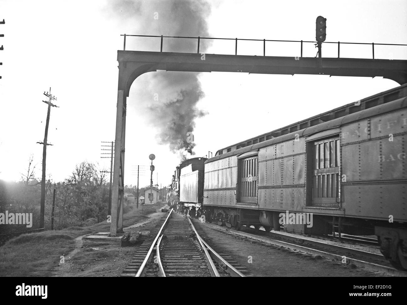 A black-and-white photograph from 1946 showing a train departing from a ...