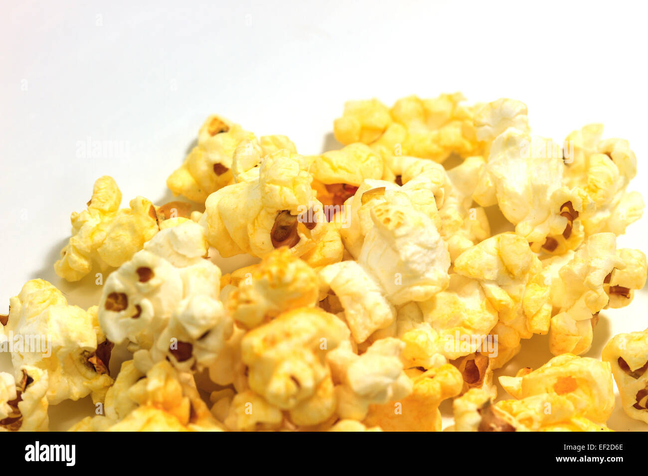Popcorn snack closeup isolated on white background Stock Photo - Alamy