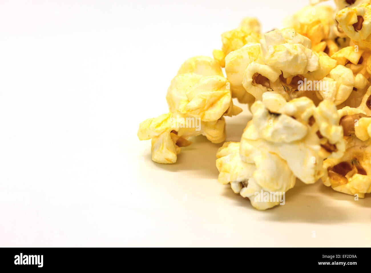 Popcorn snack closeup isolated on white background Stock Photo - Alamy