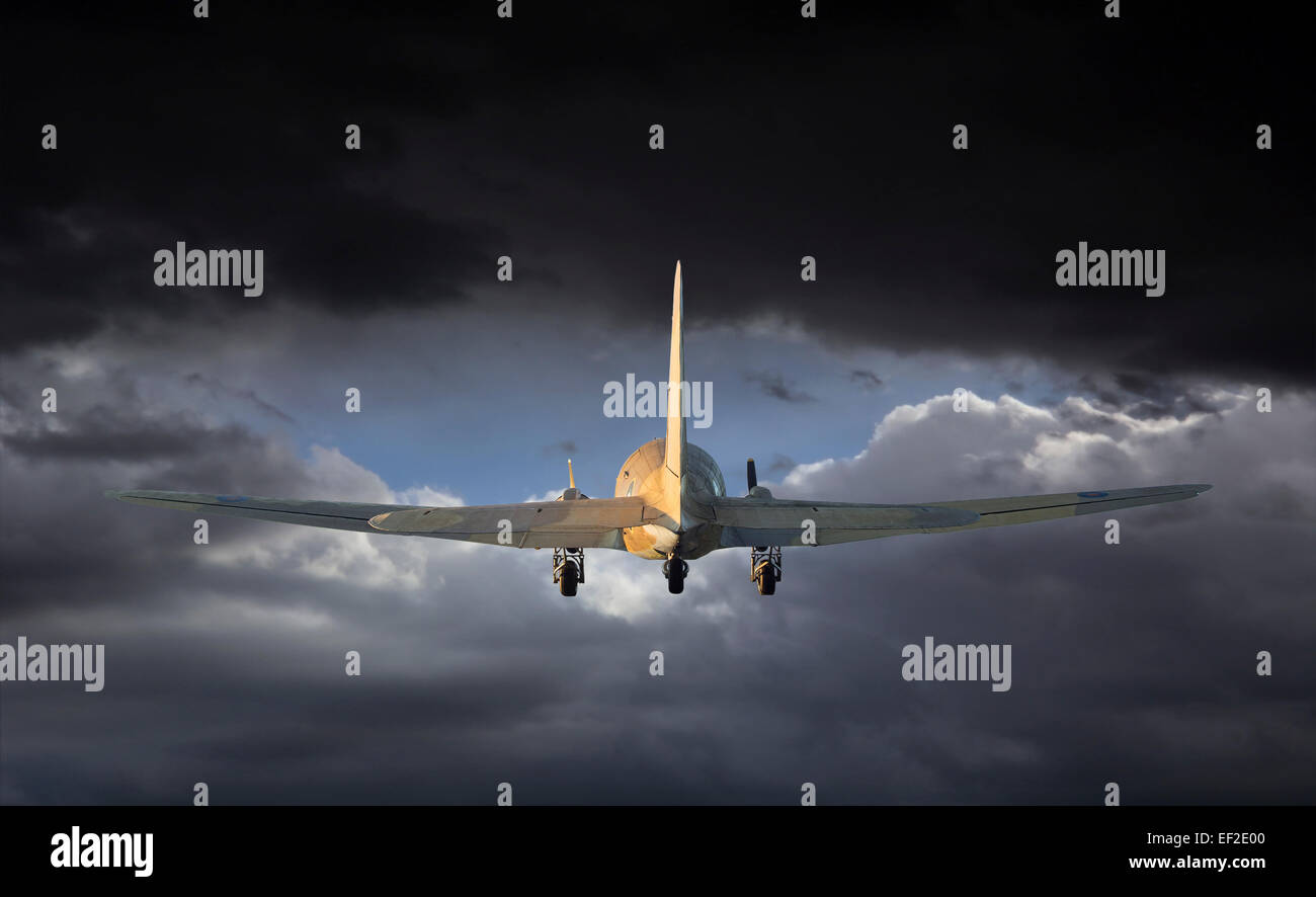 Airplane is flying into the storm Stock Photo - Alamy