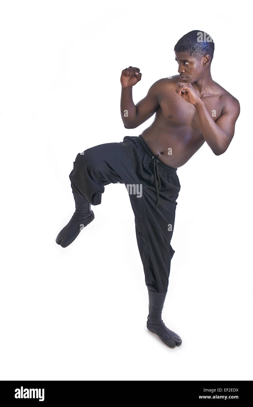 Young man practicing karate Stock Photo - Alamy