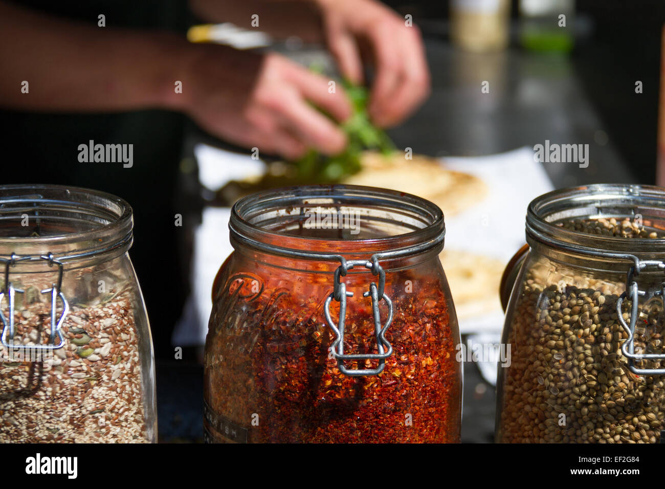 Jars full of spices at Wapping Market, London Stock Photo - Alamy