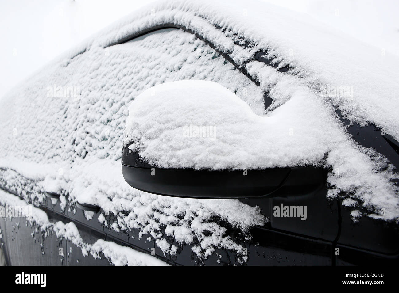 Snowed windscreen of a dark car in winter Stock Photo - Alamy