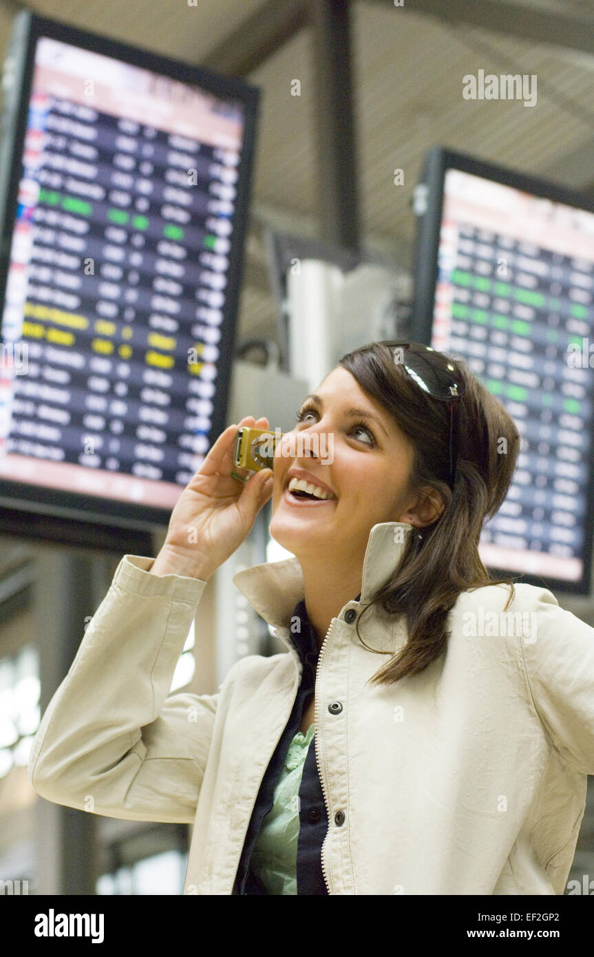 Female passenger at airport Stock Photo - Alamy