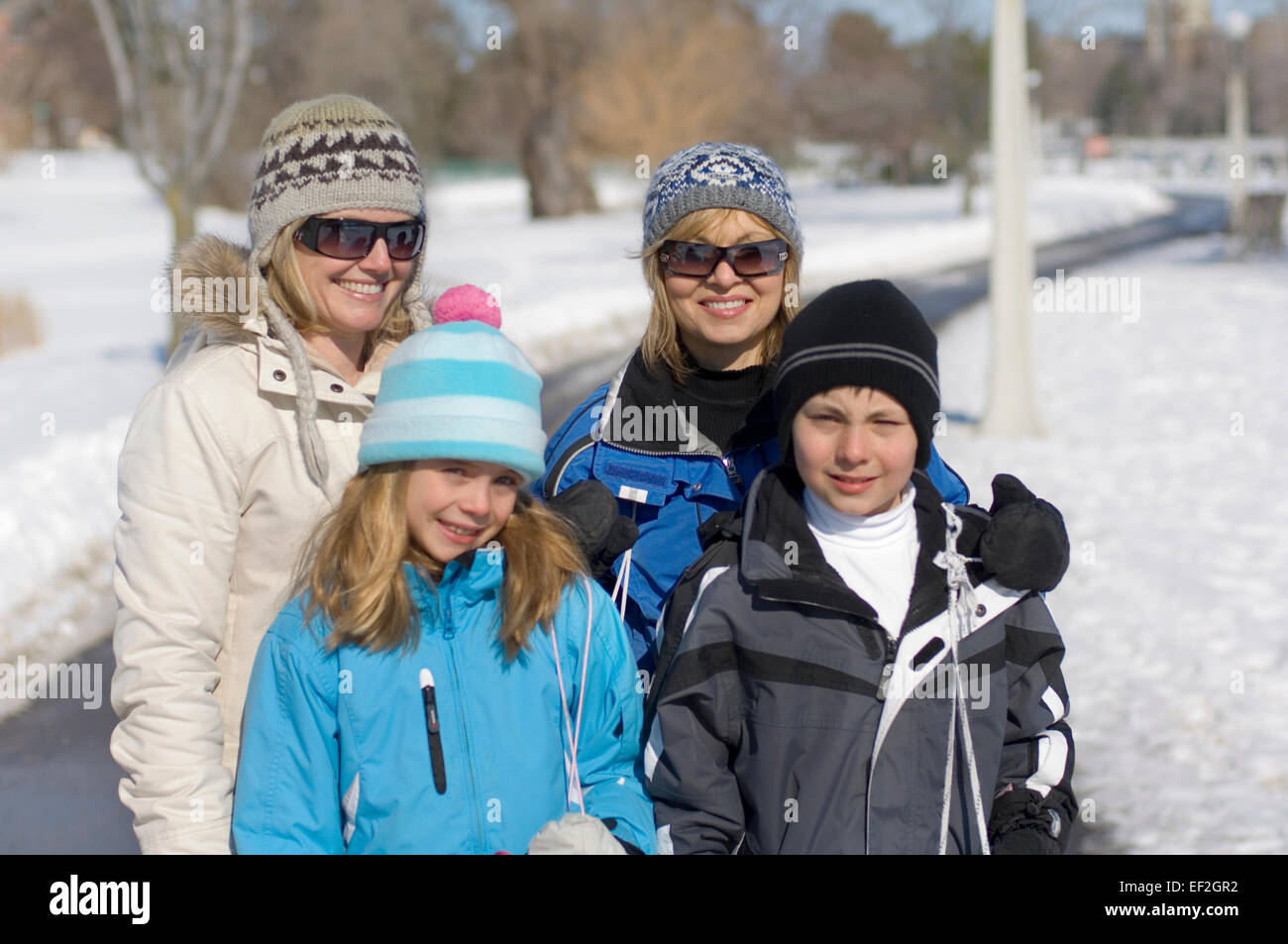 Ice skating friends and family outdoors Stock Photo - Alamy