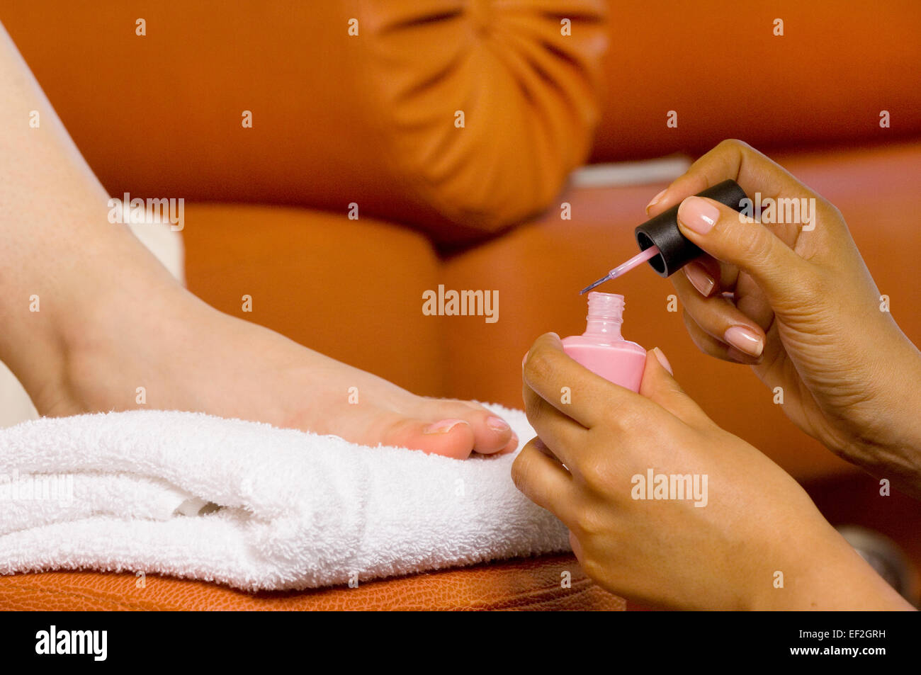 Young woman getting a pedicure Stock Photo - Alamy