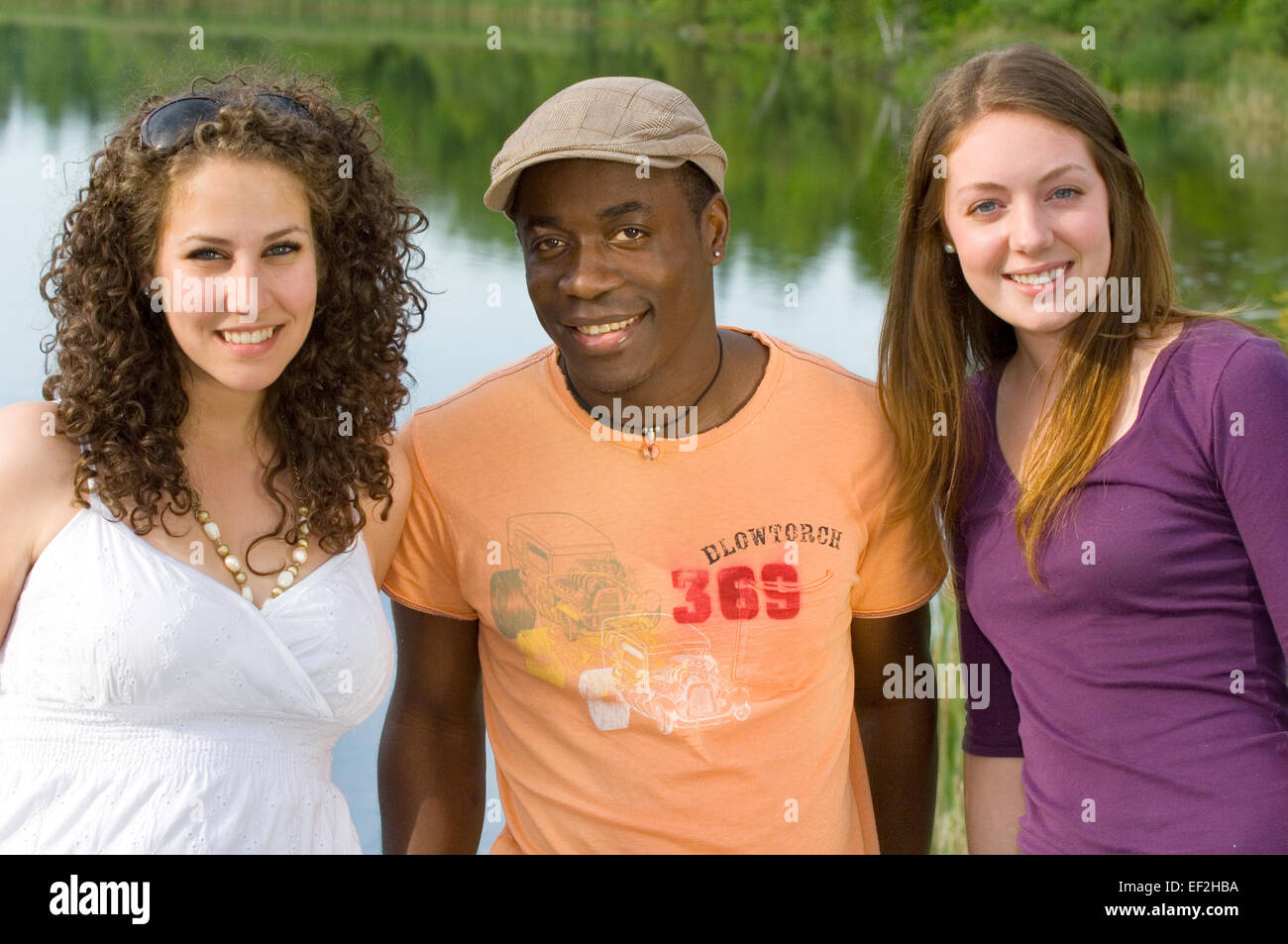 Three friends at a park Stock Photo - Alamy