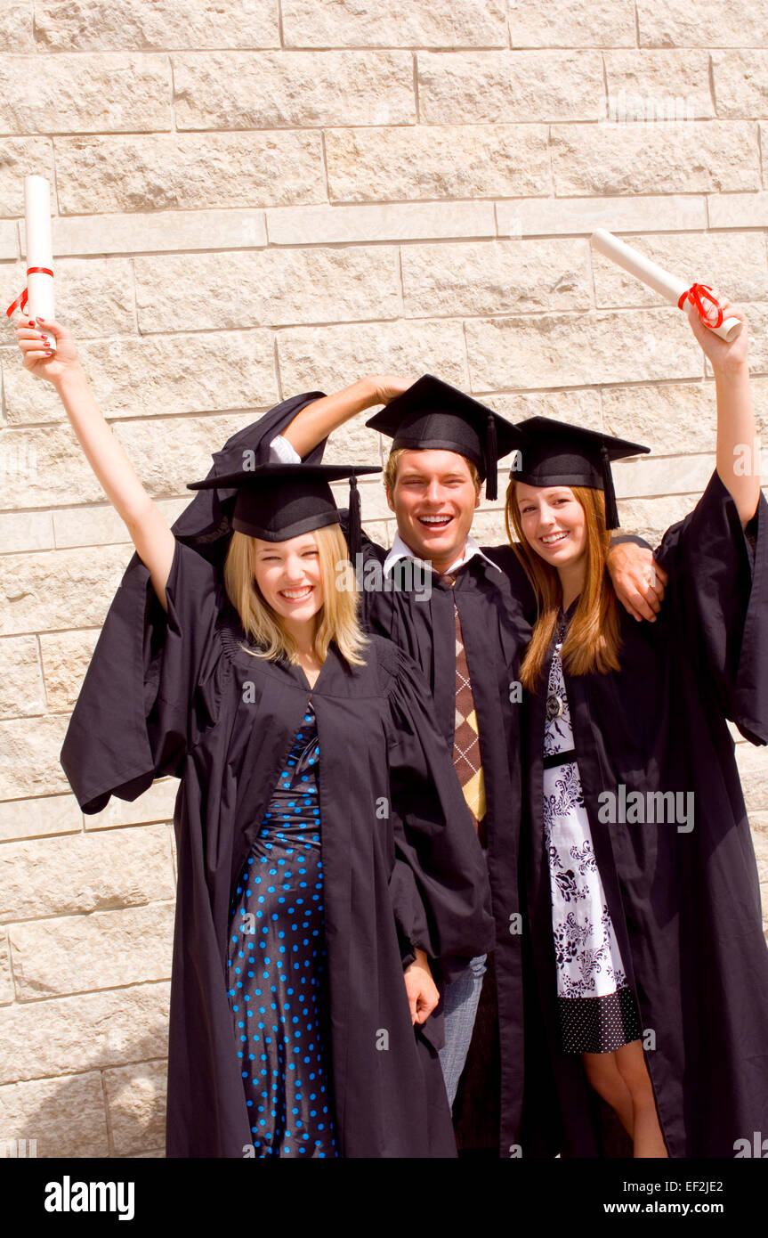 Three friends at graduation ceremony Stock Photo - Alamy