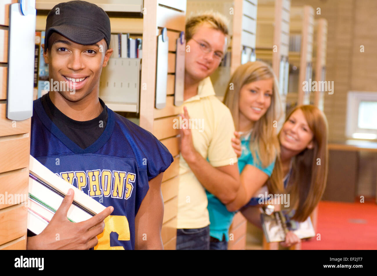 Students library books piles hi-res stock photography and images - Alamy