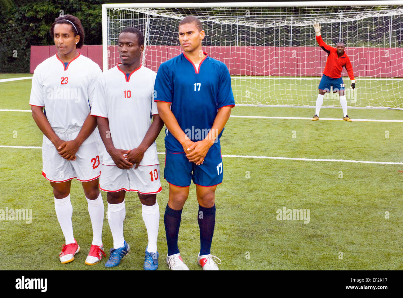 Soccer players playing a game of soccer Stock Photo - Alamy
