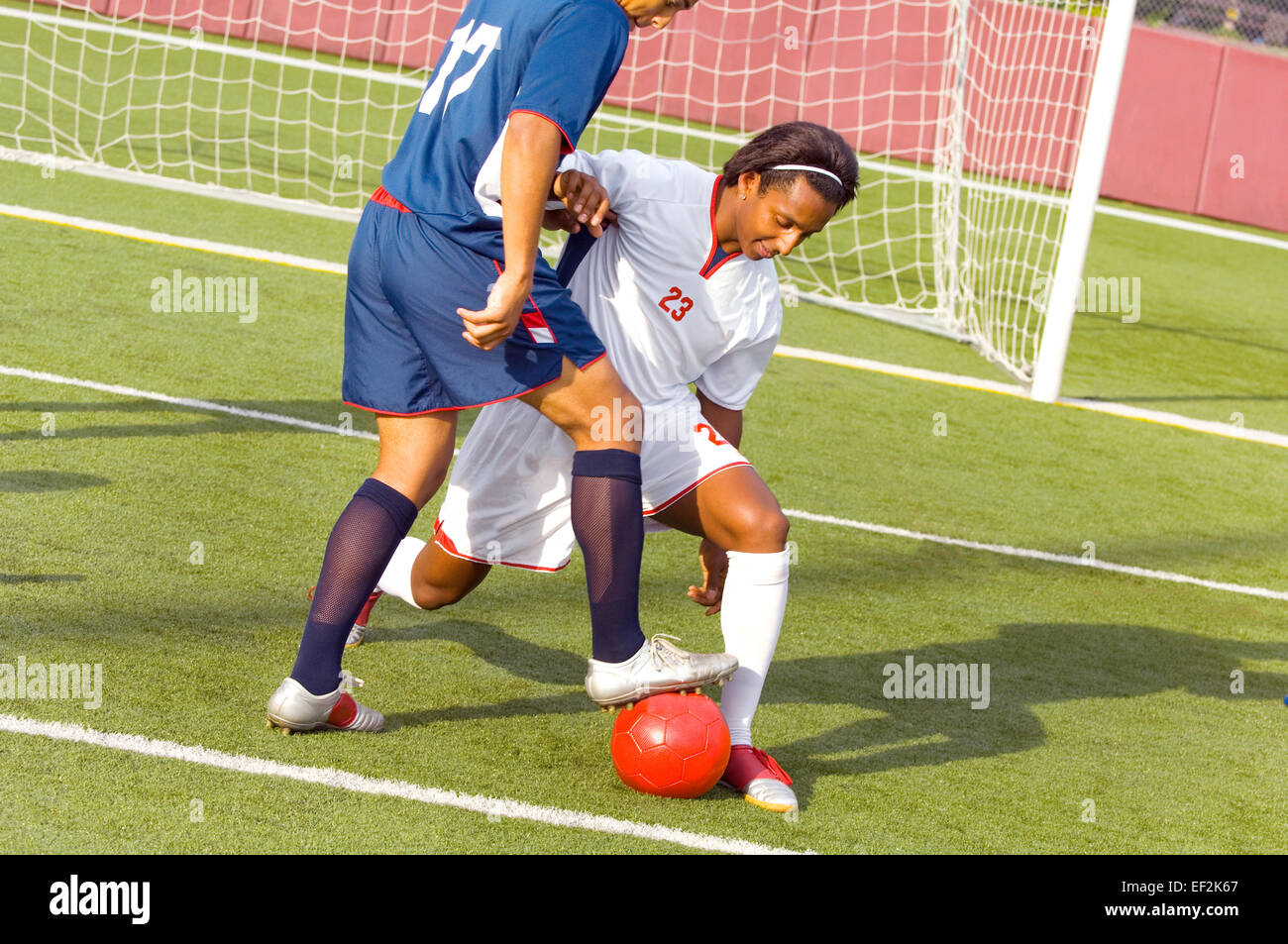 Soccer players playing a game of soccer Stock Photo - Alamy