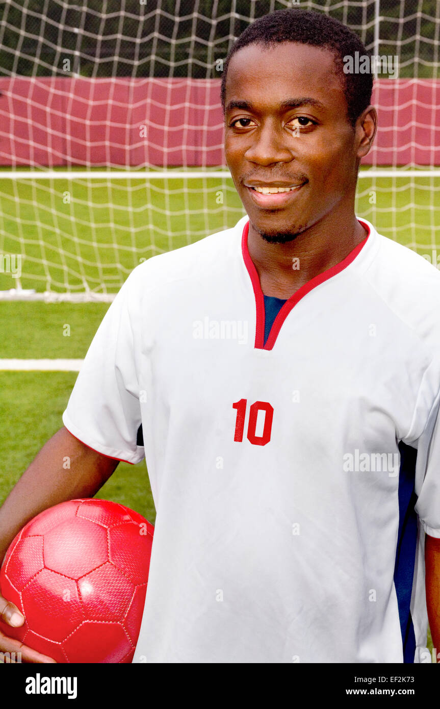 Soccer player on field Stock Photo - Alamy