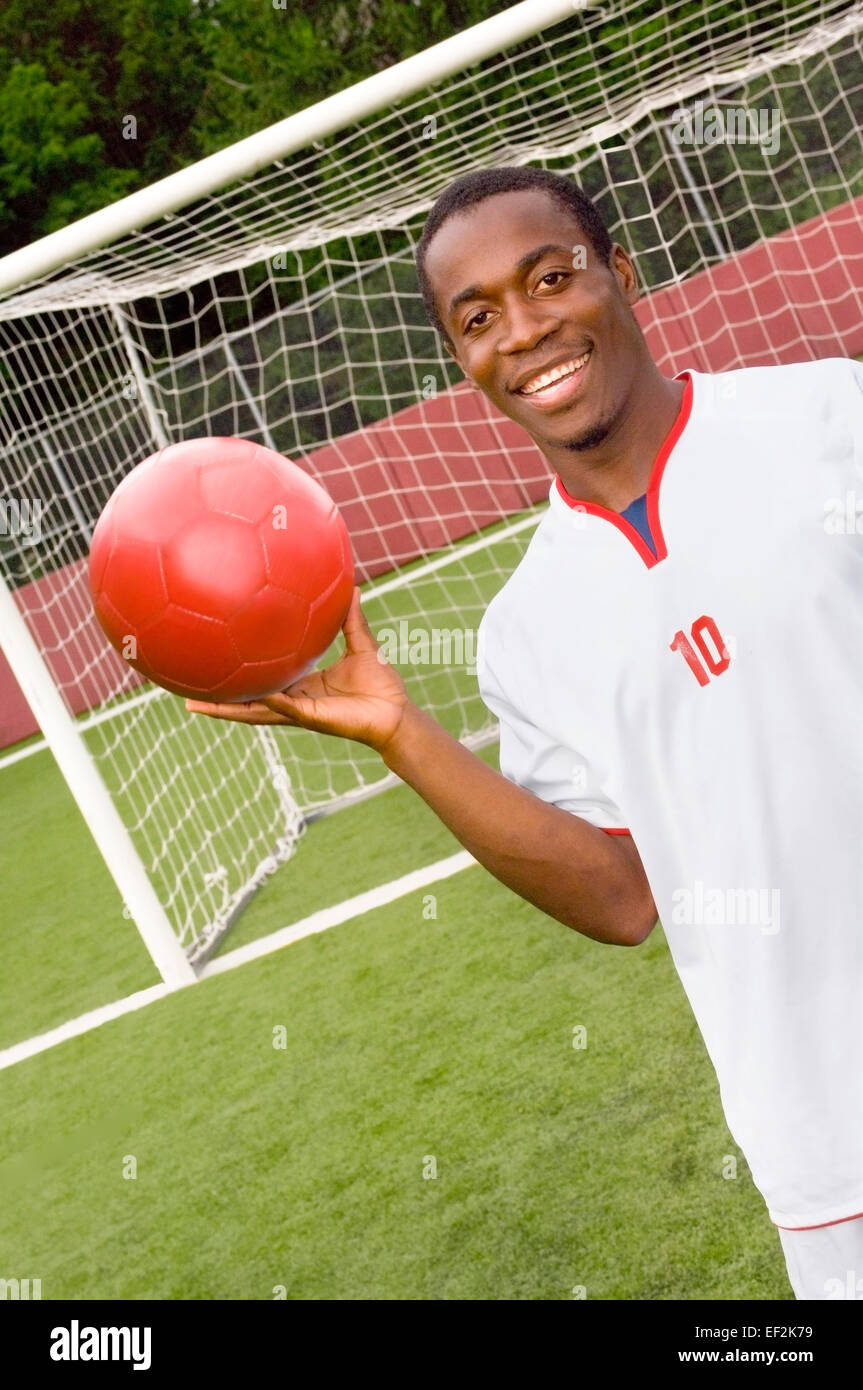 Soccer player on field Stock Photo - Alamy