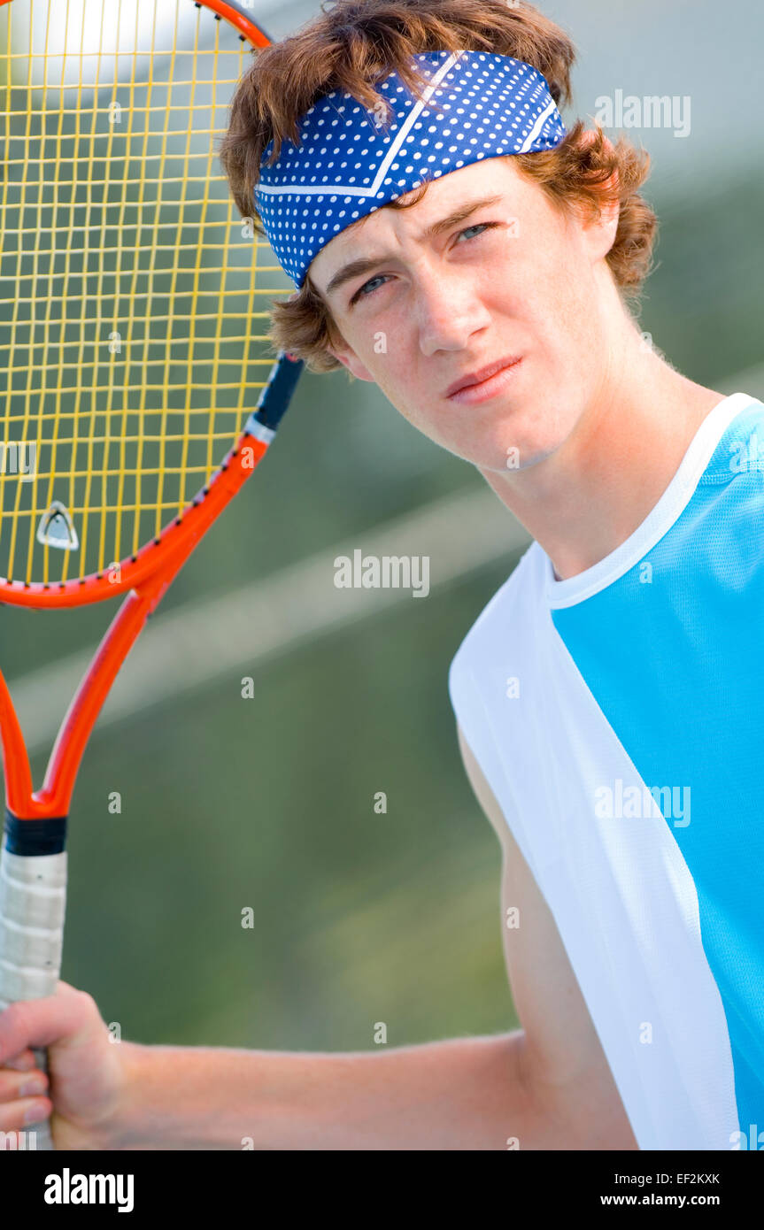Tennis player alone on a court Stock Photo - Alamy