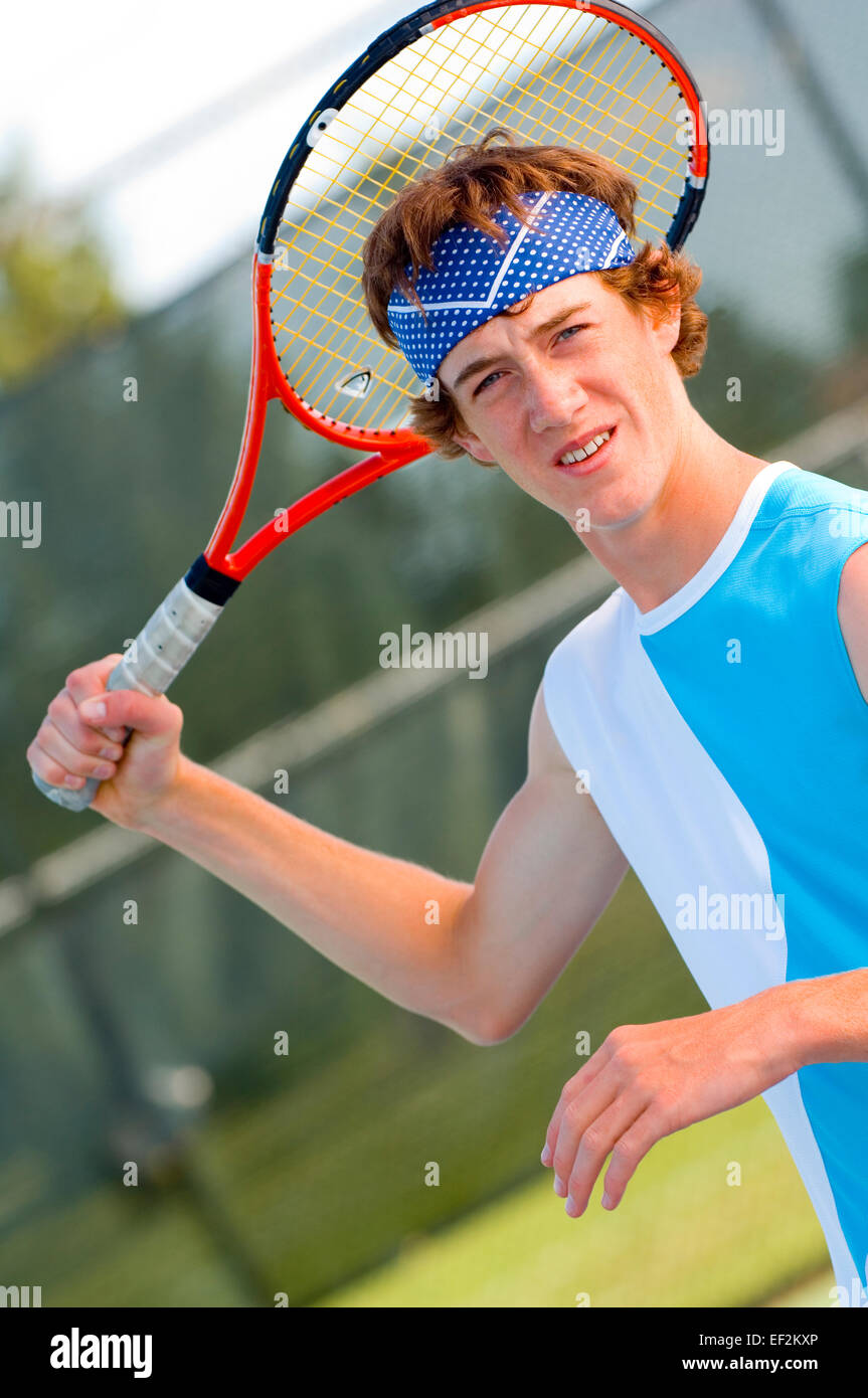 Tennis player alone on a court Stock Photo - Alamy