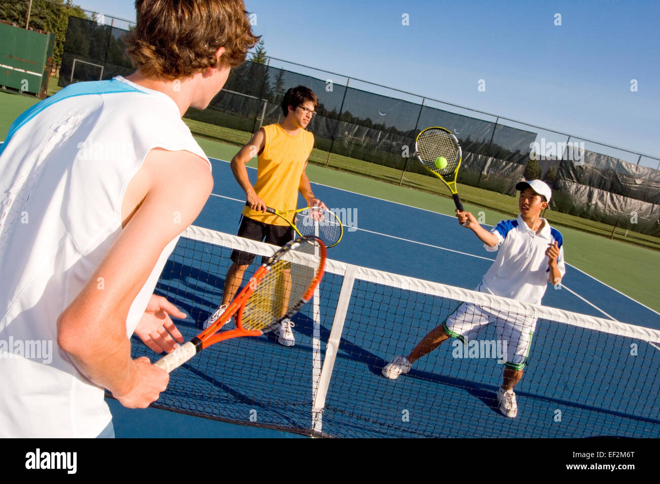 Group of tennis players on a court Stock Photo - Alamy