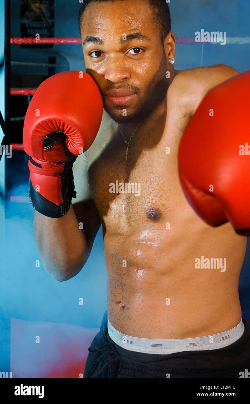 Male boxer practising punching hi-res stock photography and images - Alamy