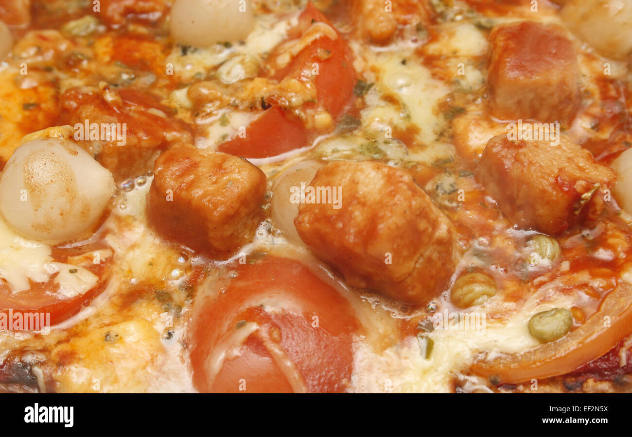 image of homemade pizza covered wth quorn chicken style pieces Stock ...