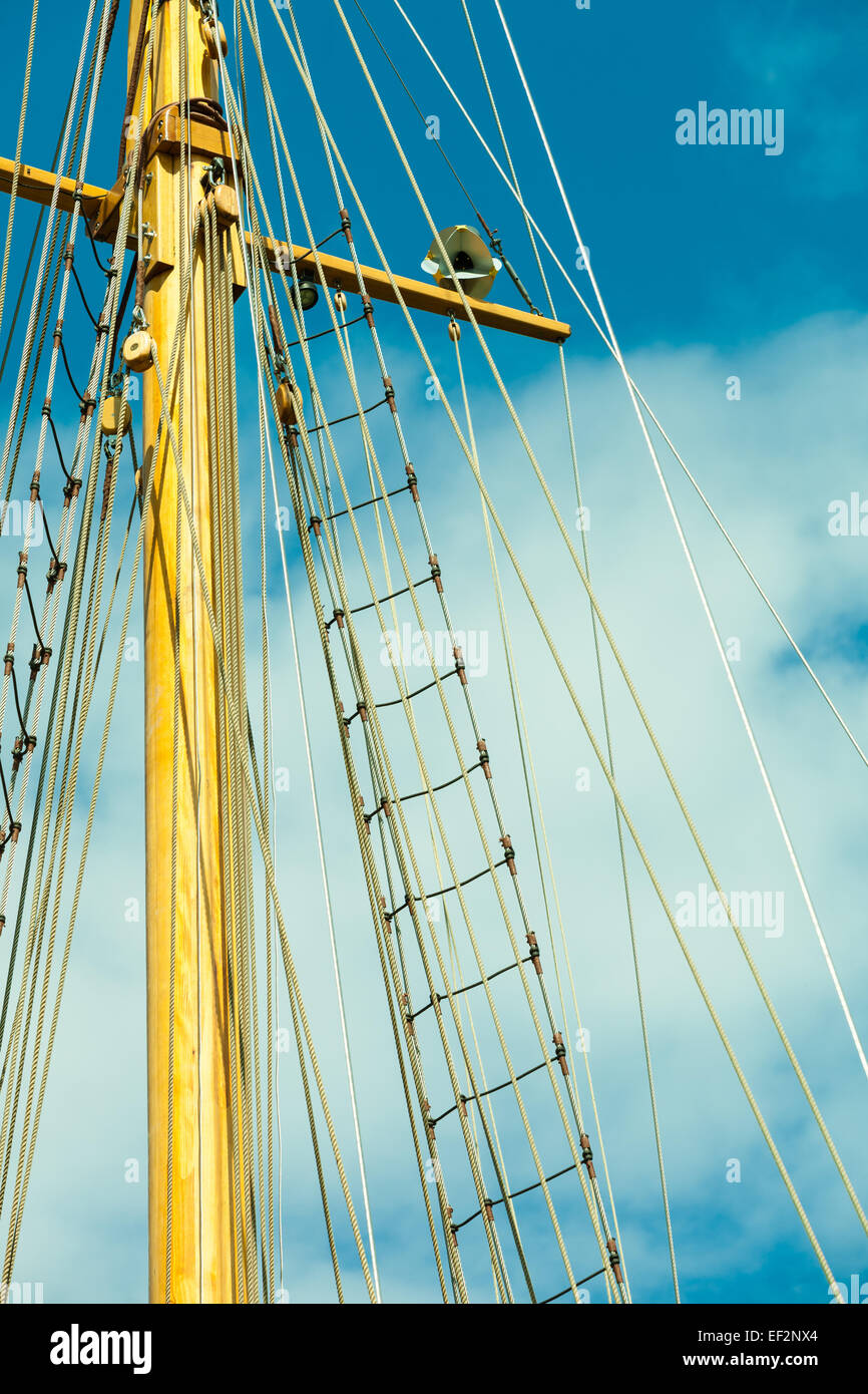 Yachting. Sailboat view of different parts of yacht. Mast against blue ...